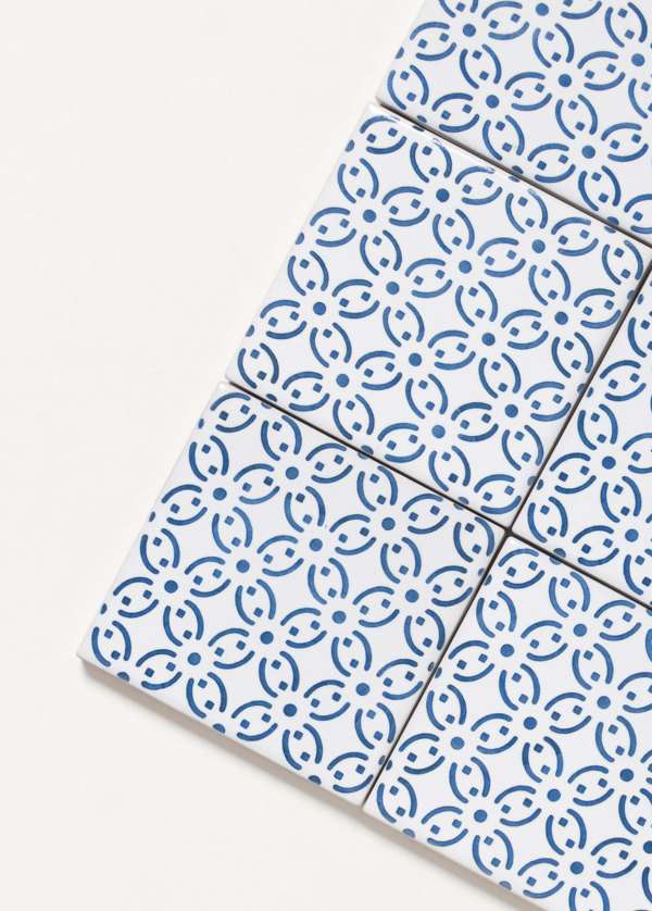 Blue and white patterned terracotta bathroom tiles.