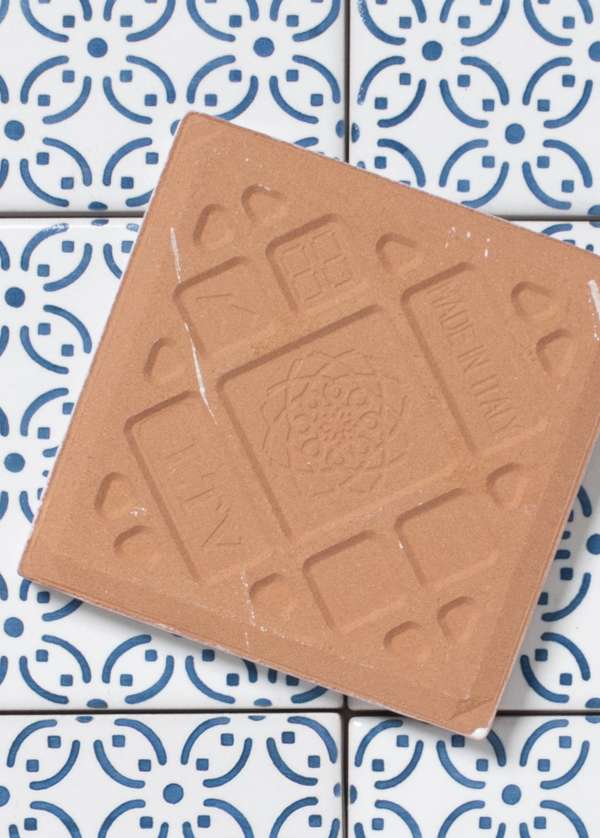 Blue and white patterned terracotta bathroom tiles.
