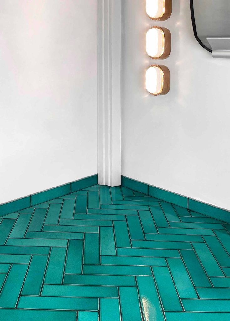 Turquoise green lava stone restroom - By Made a Mano.