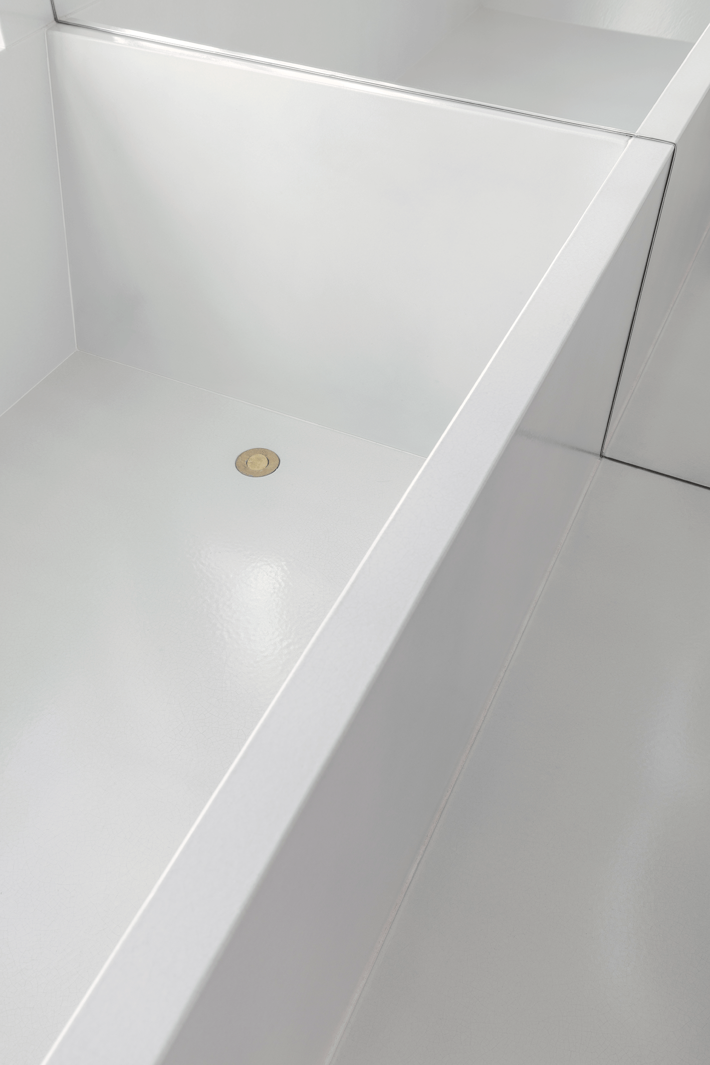 Pure white lava stone bathroom - Made a Mano