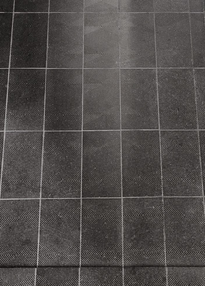 Speckled dark blue lava stone bathroom - By Made a Mano.