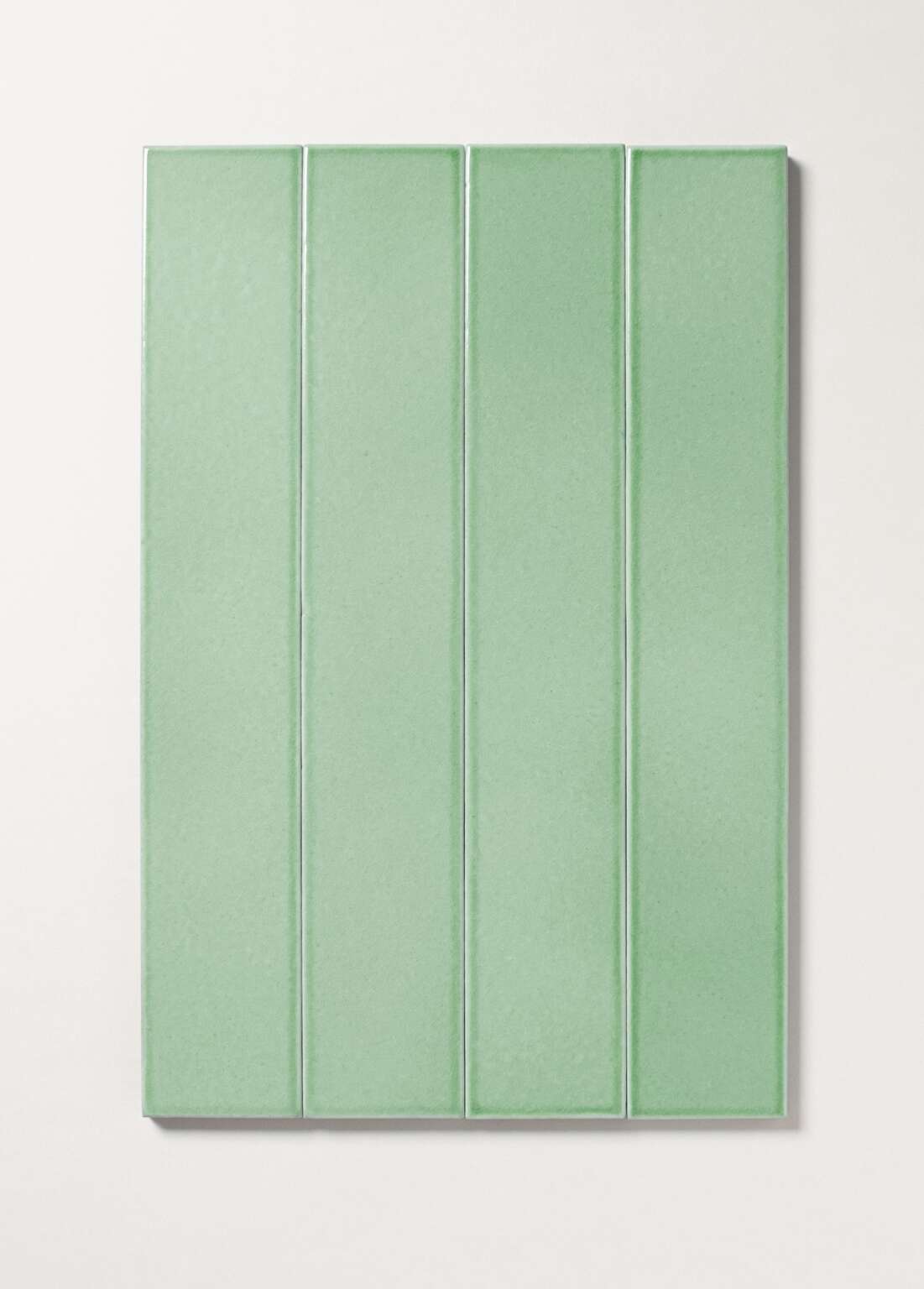 Handmade light green lava or terracotta tiles form Made a Mano.