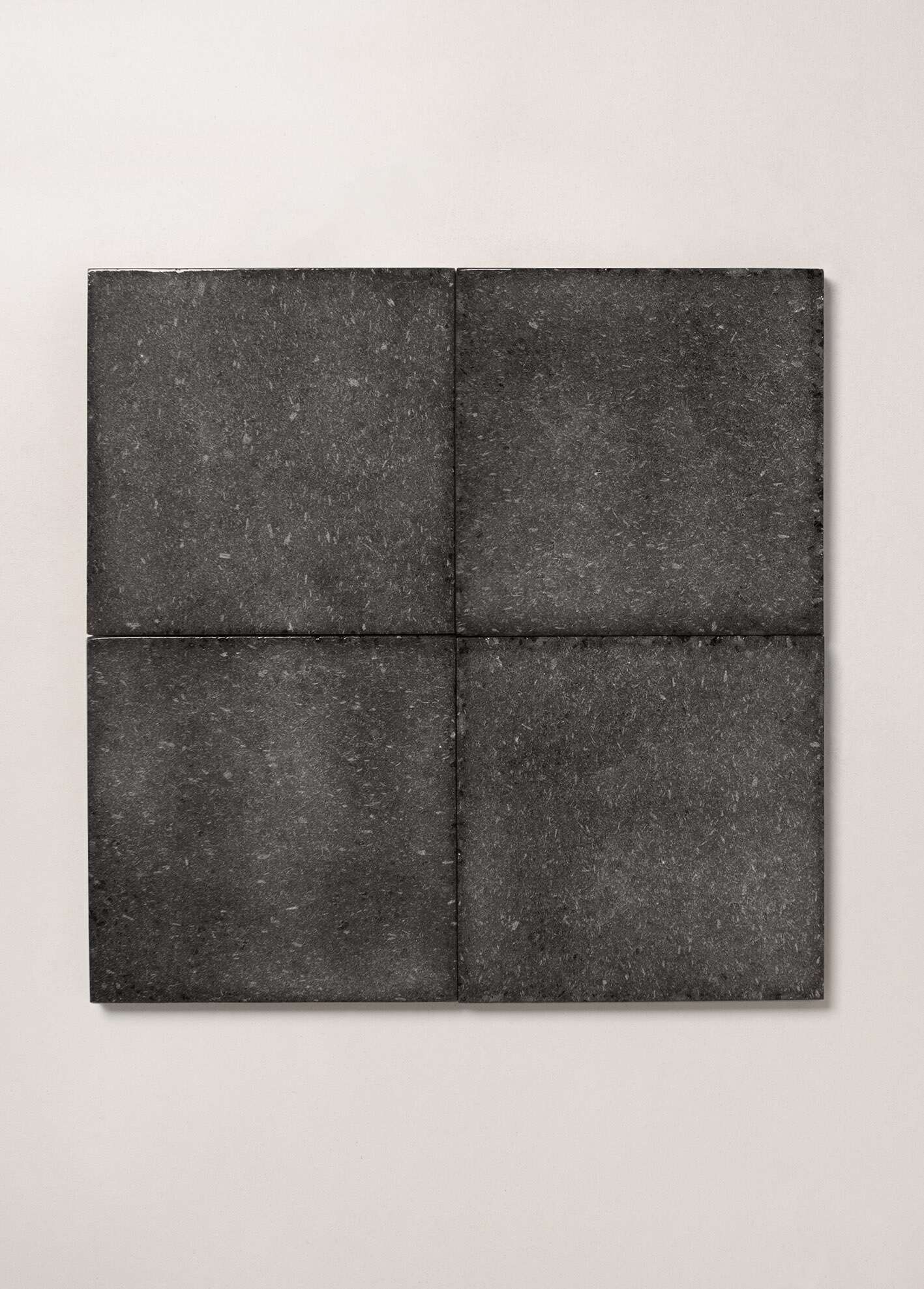 Speckled lava stone tiles - By Made a Mano.