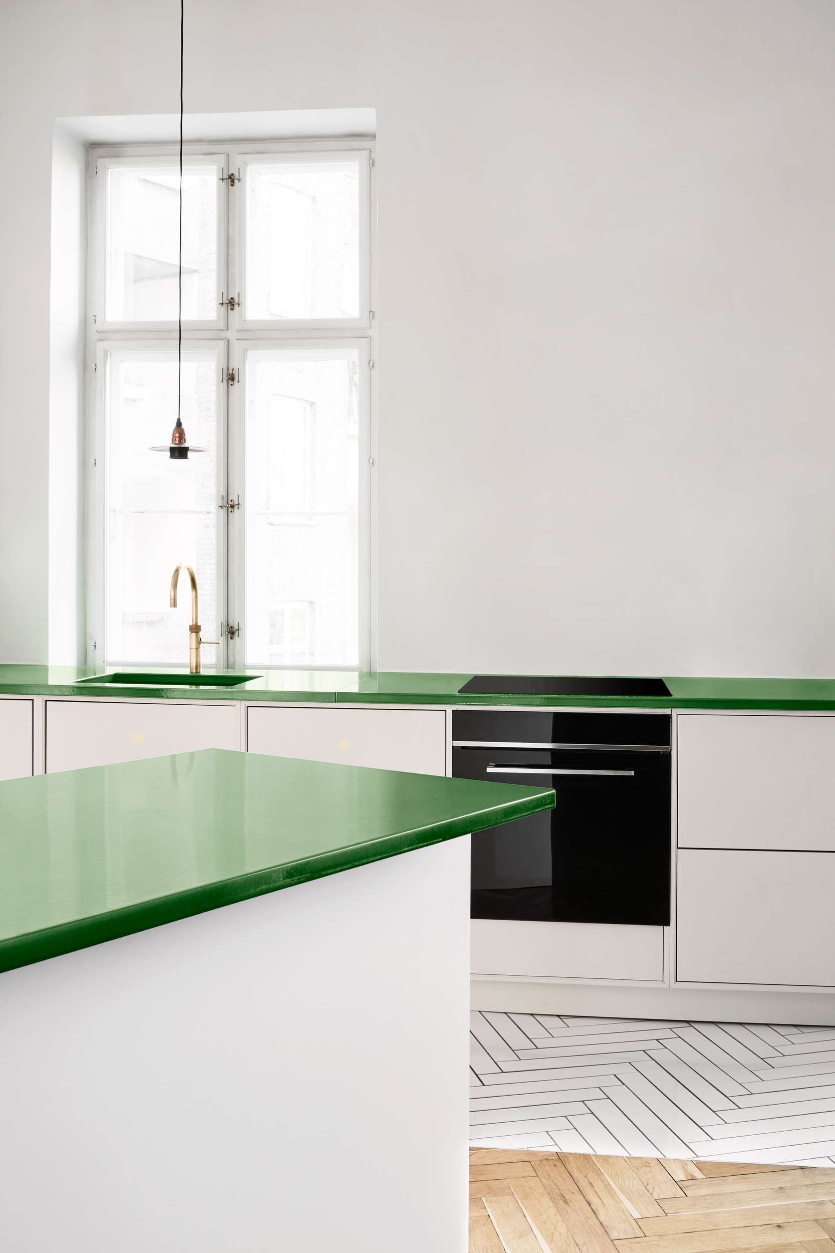 Clover green and white lava stone kitchen - Made a Mano Denmark.
